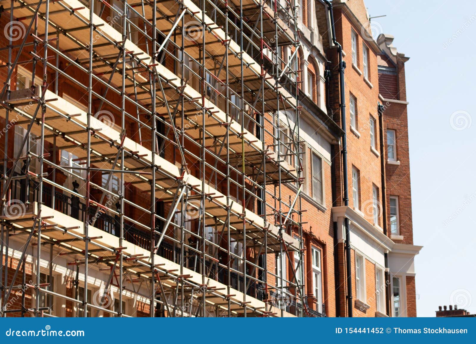 Scaffolding On House Facade, Apartment Buildingwith Scaffold Royalty ...
