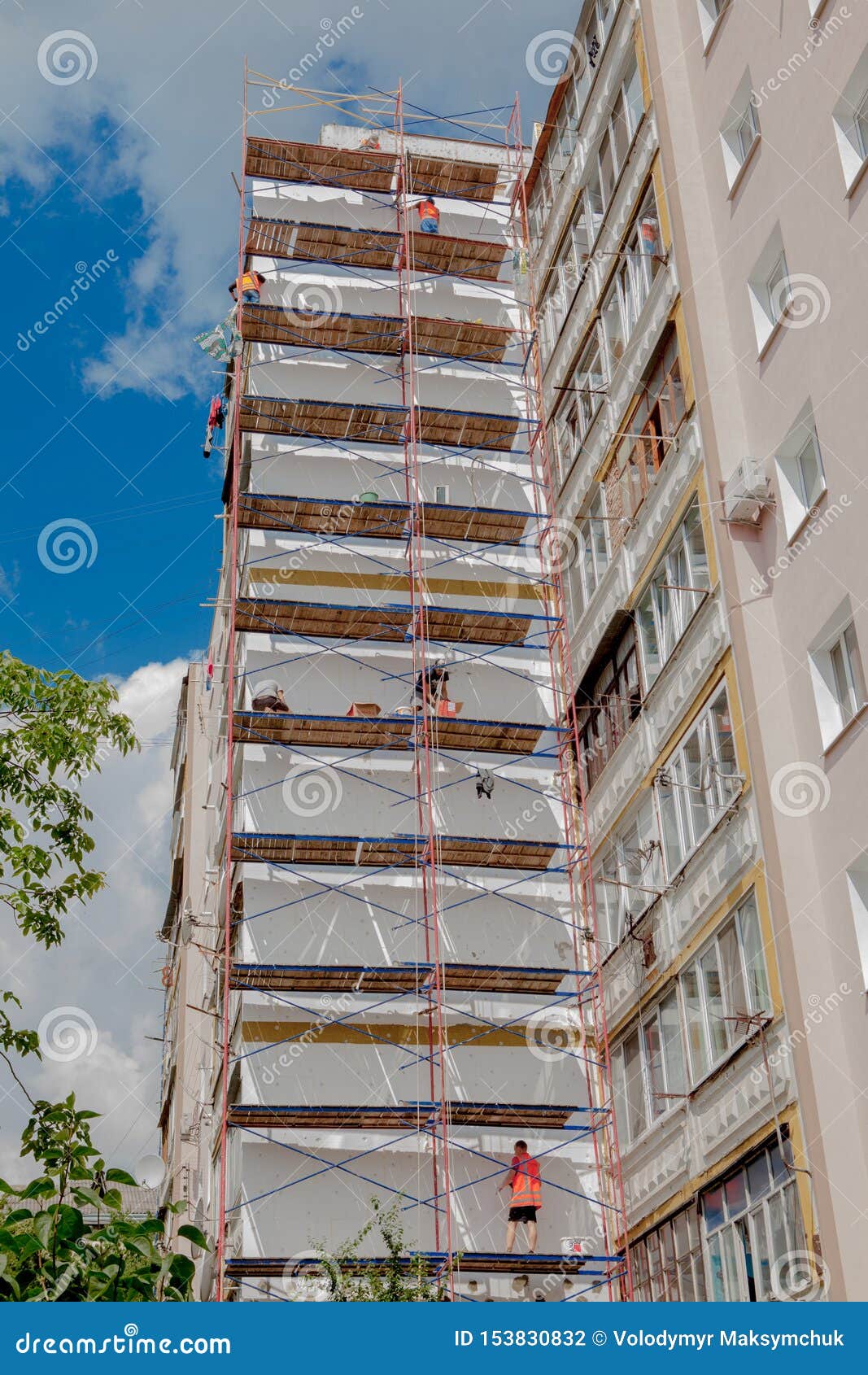 Scaffolding on a Multistory Building. Warming of the Outer Wall Panel ...
