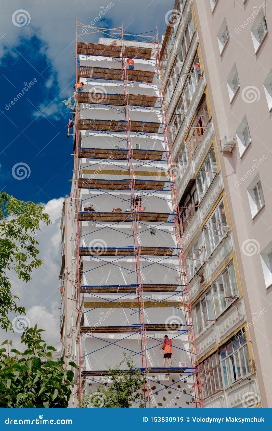 Scaffolding on a Multistory Building. Warming of the Outer Wall Panel ...