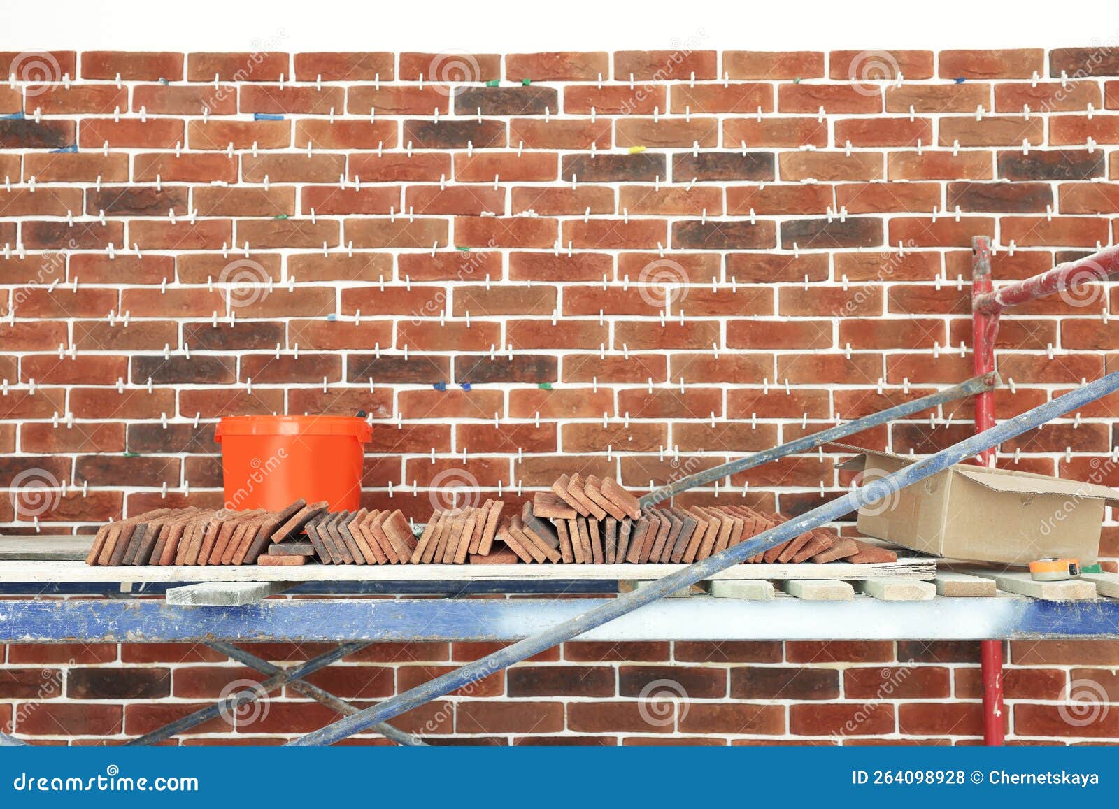 Scaffolding Near Wall with Decorative Bricks and Tile Leveling System ...