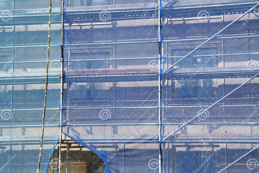 Scaffolding and Netting in a Construction Site Stock Photo - Image of ...
