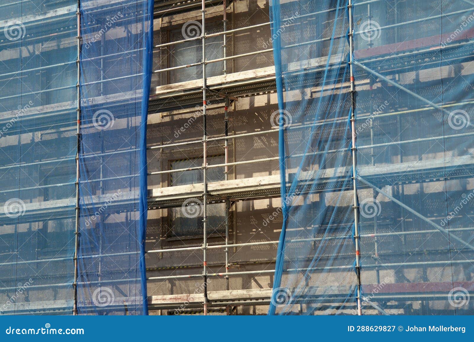 Scaffolding and Netting in a Construction Site Stock Image - Image of ...
