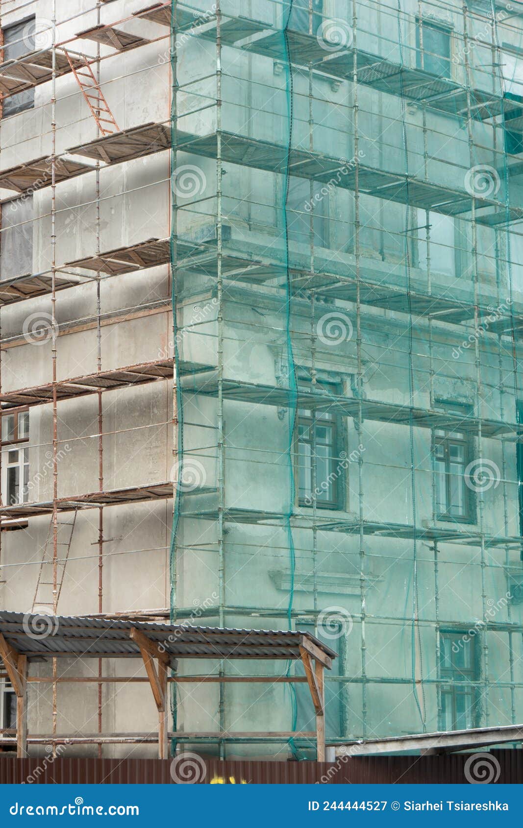 Scaffolding Outside the House Covered with Green Mesh Stock Image ...