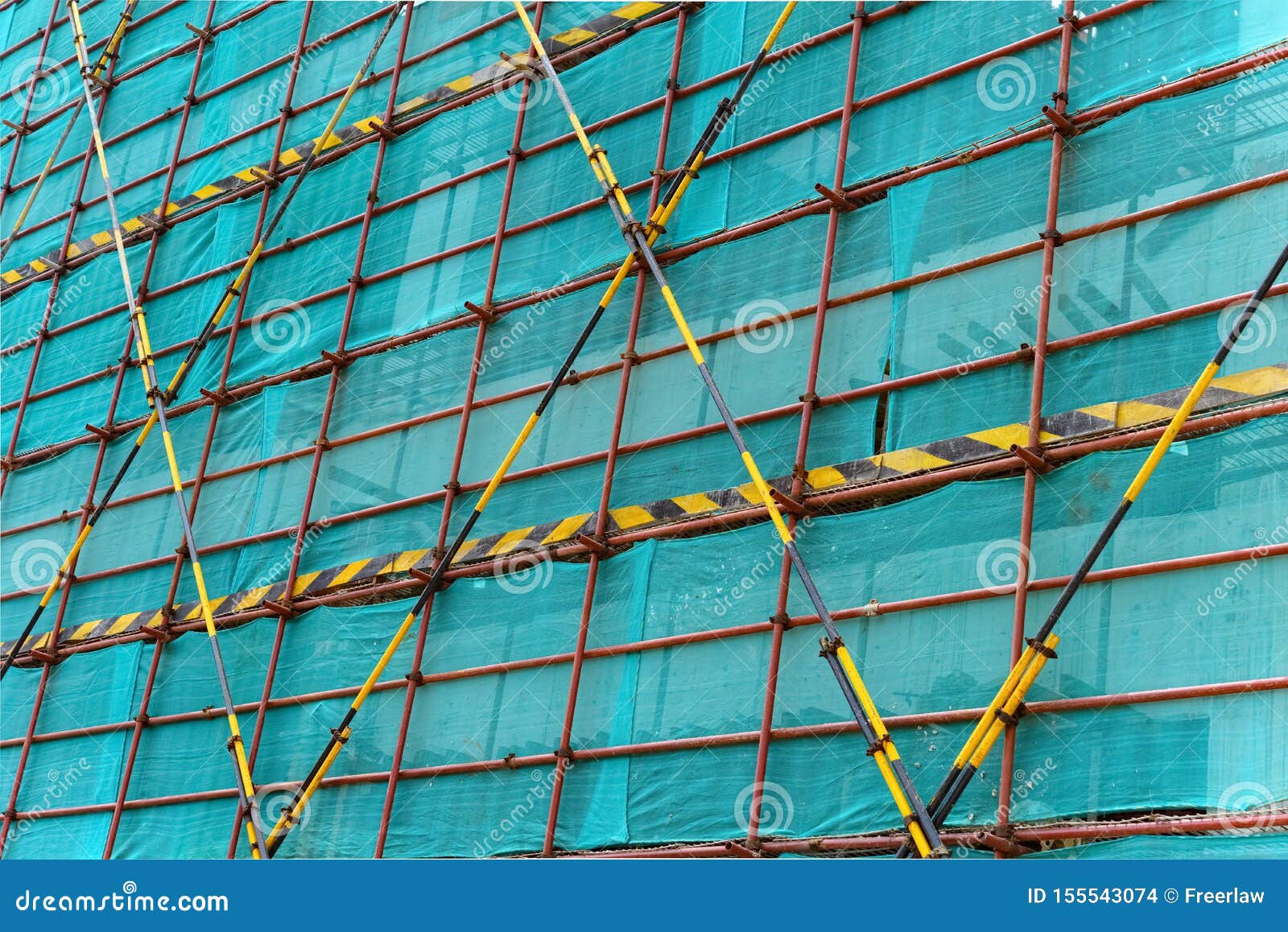 Scaffolding & Protection Netting on an Unfinished Building Stock Photo ...