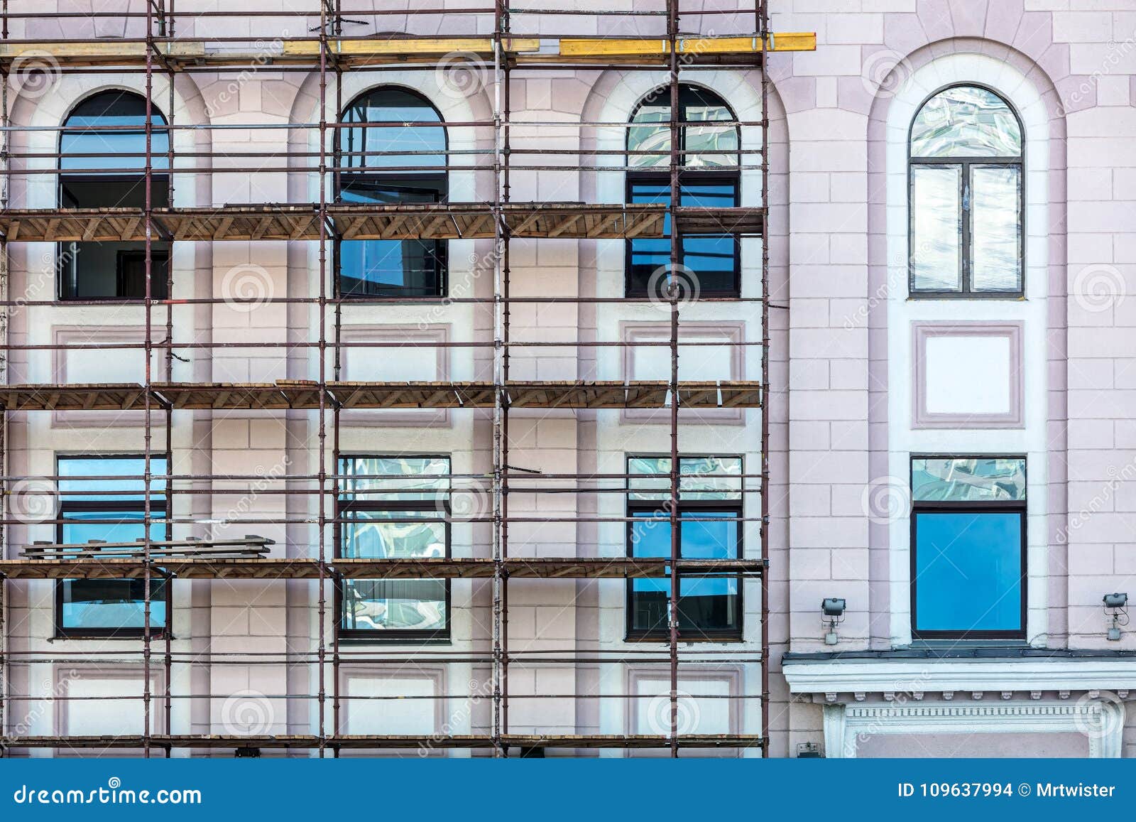 Scaffolding during Repair of Facade. Renovation of Building. Stock ...