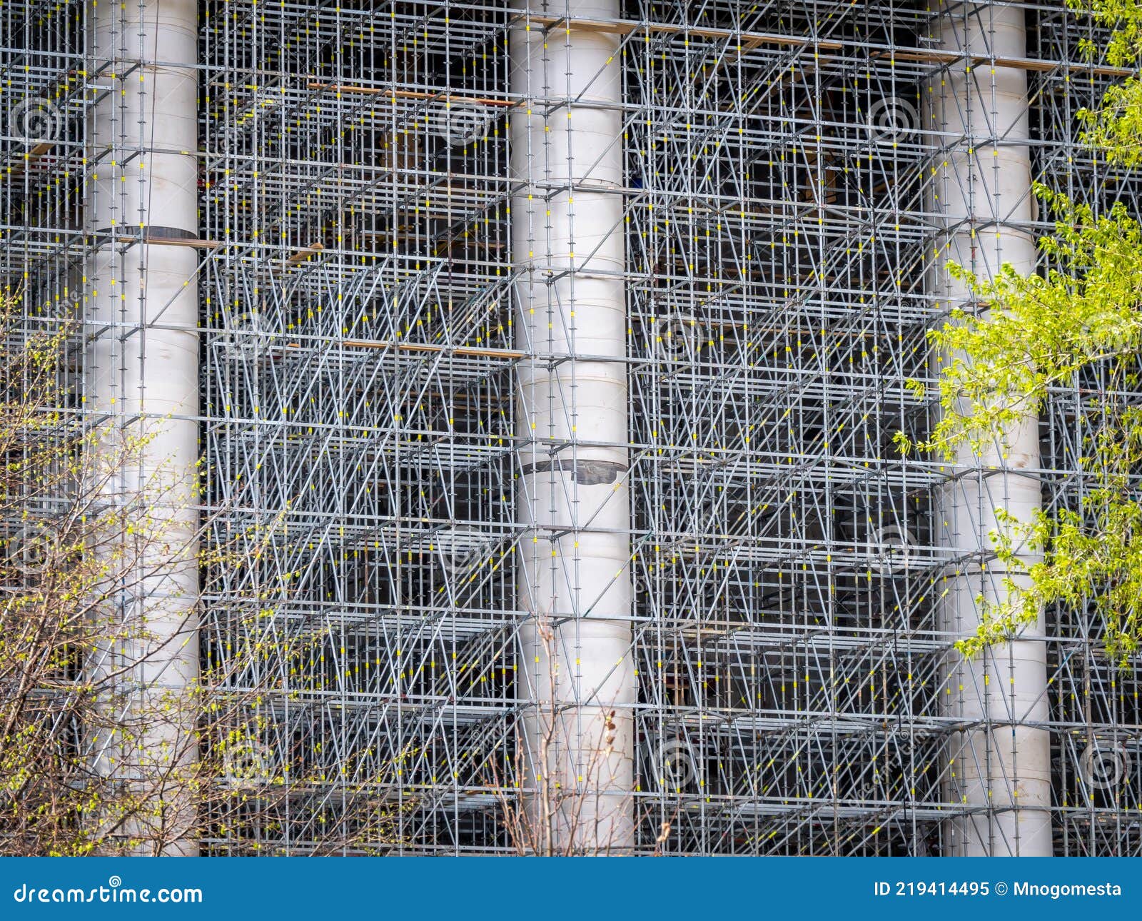 Scaffolding on a Skyscraper Construction Site. Concrete Columns ...