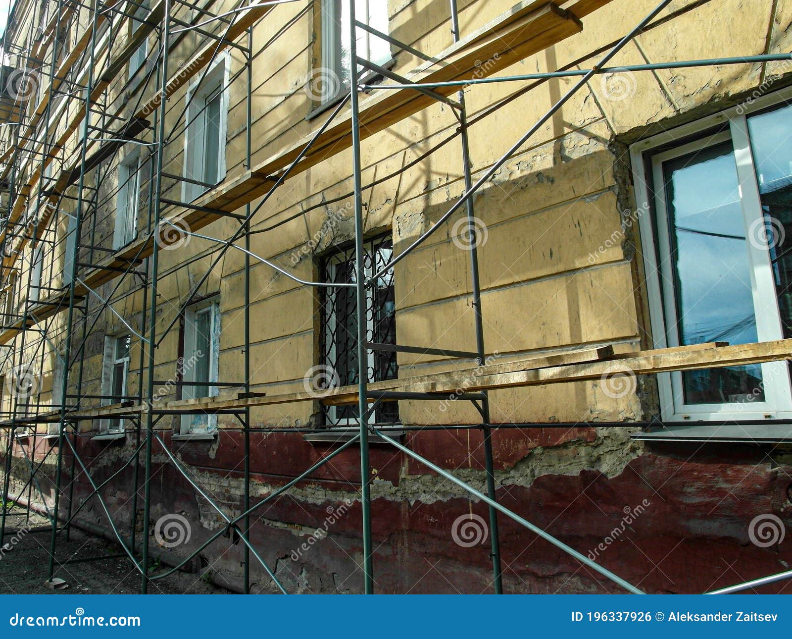 Scaffolding Stands Along the Wall of a Building Preparing for Repair ...