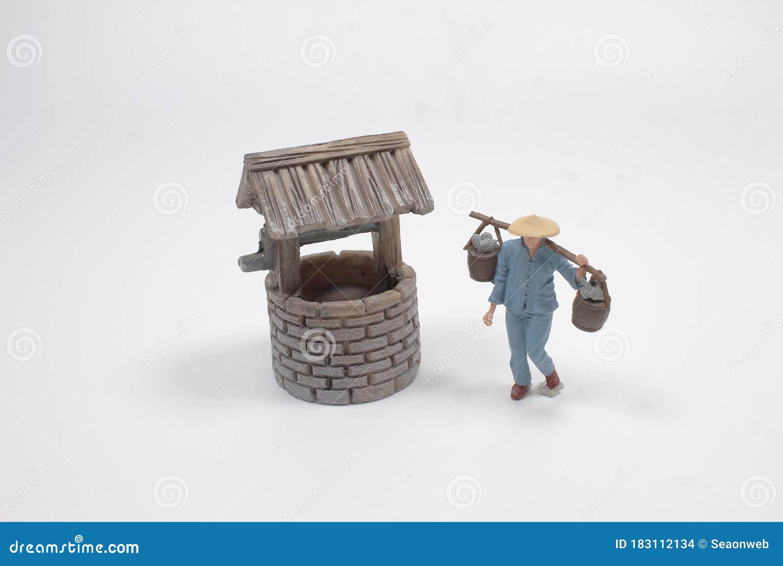 A Scale of Fun Figure with the Well Stock Photo - Image of nature ...