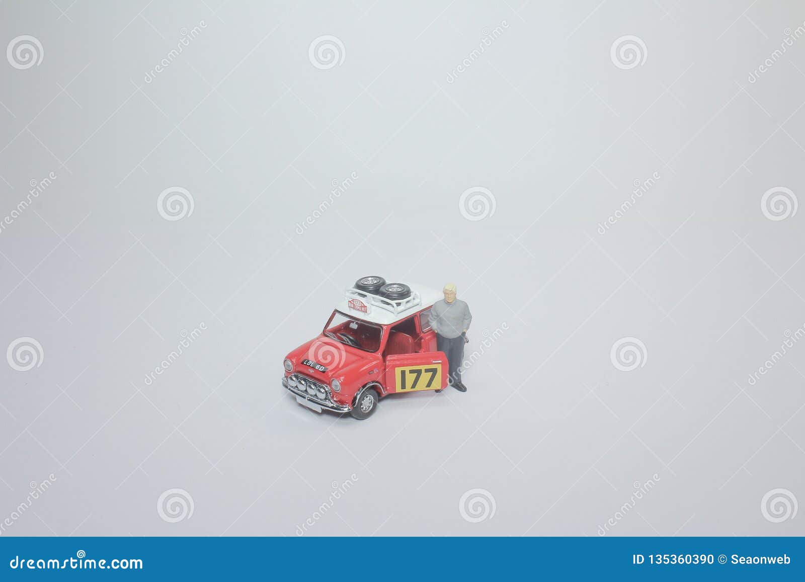 A Scale of Mini Cooper with Figure Stock Photo - Image of funny, pram ...