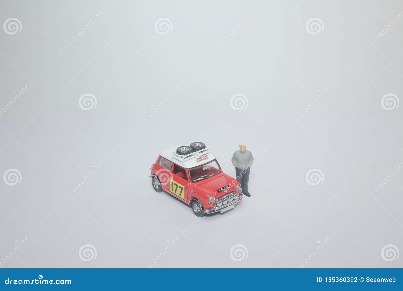 A Scale of Mini Cooper with Figure Stock Photo - Image of plastic ...