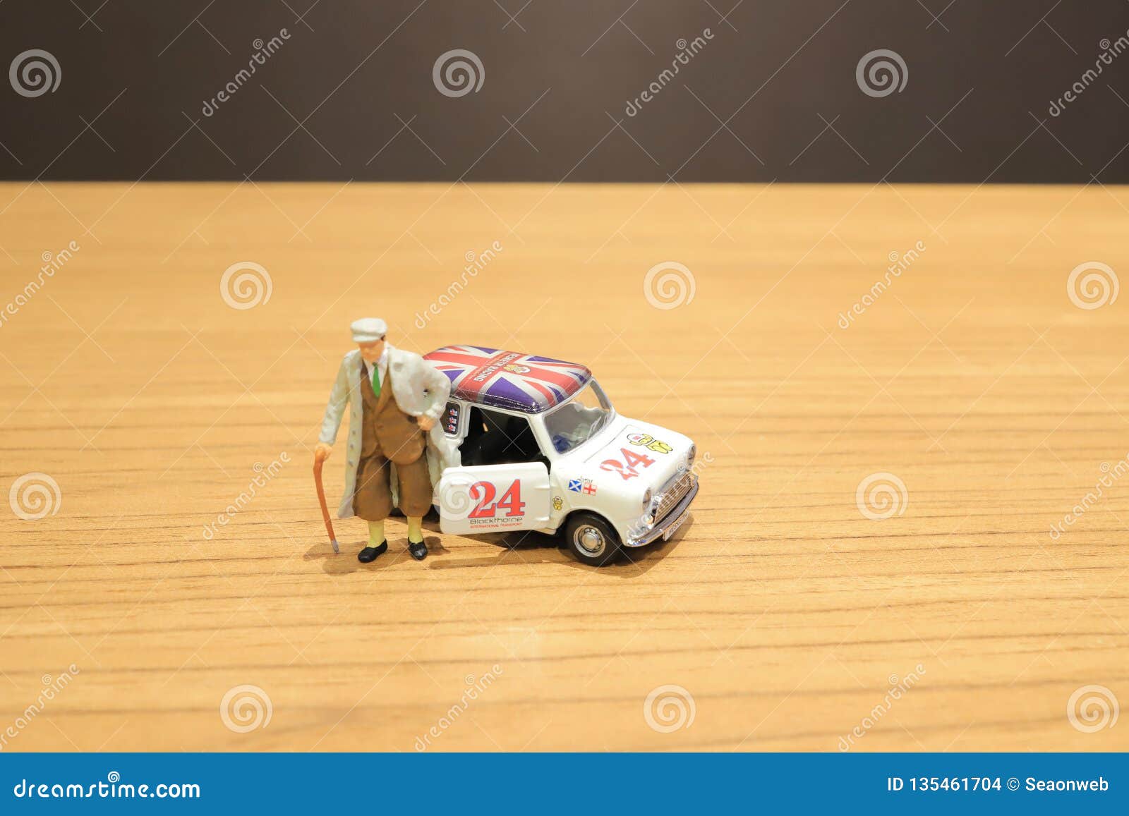 The Scale of Mini Cooper with Figure Editorial Stock Image - Image of ...
