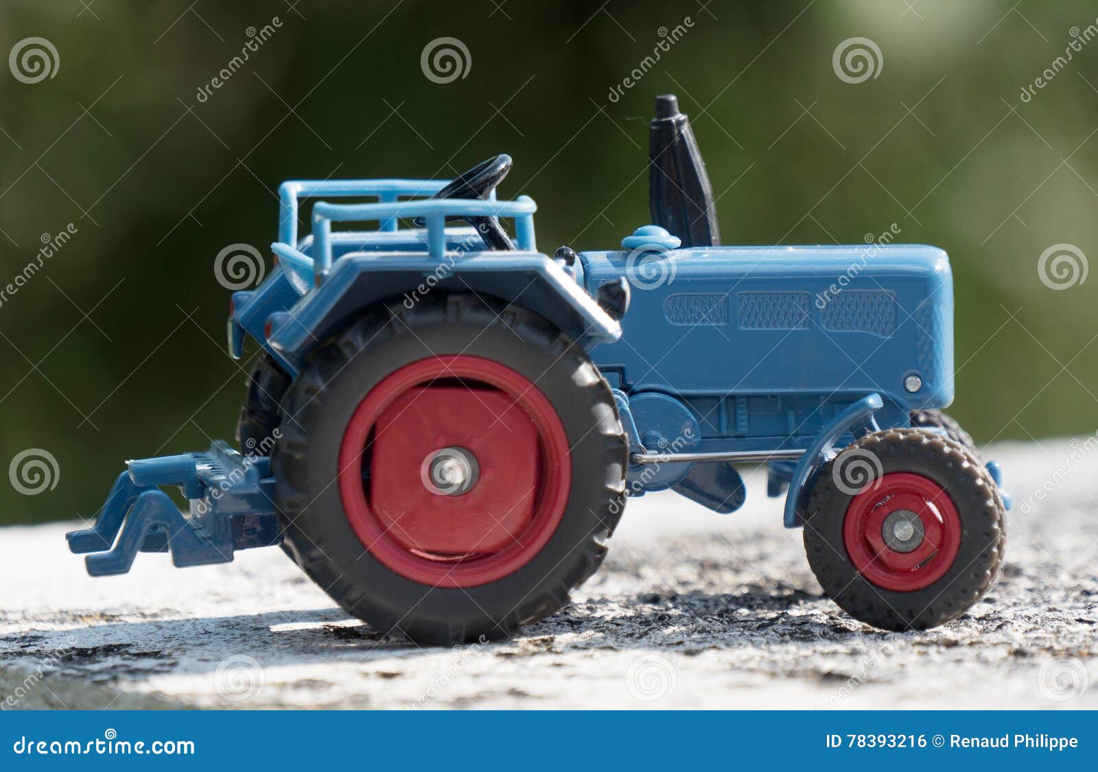 Blue Farm Tractor Plowing Large Farm Field Royalty-Free Stock Photo ...