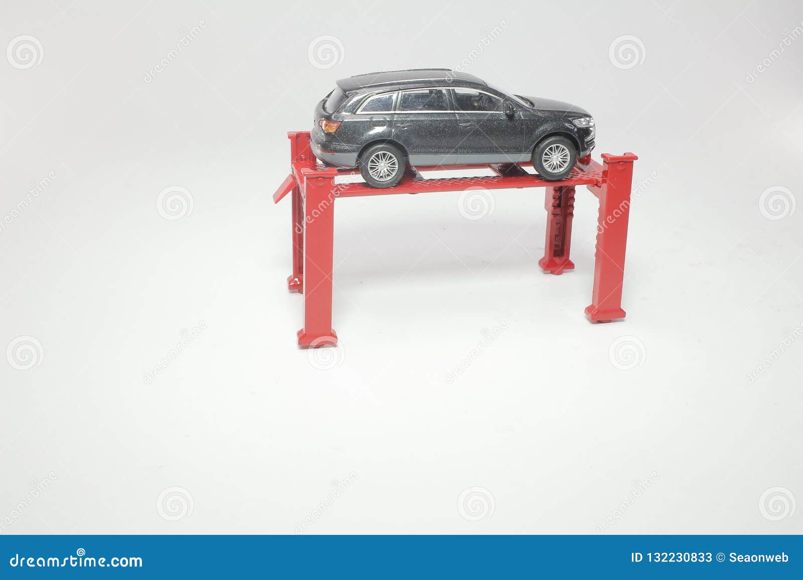A Scale Tiny of Model Car Lift Stock Image - Image of lifting, help ...