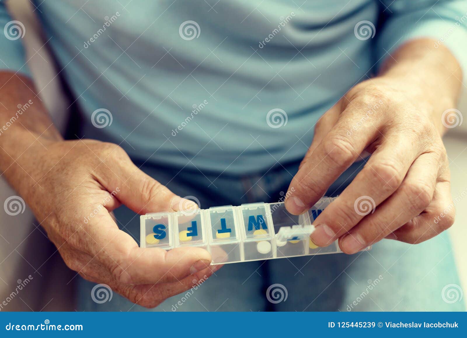 Scaled Up Look on Elderly Gentleman Taking Medication Stock Image ...
