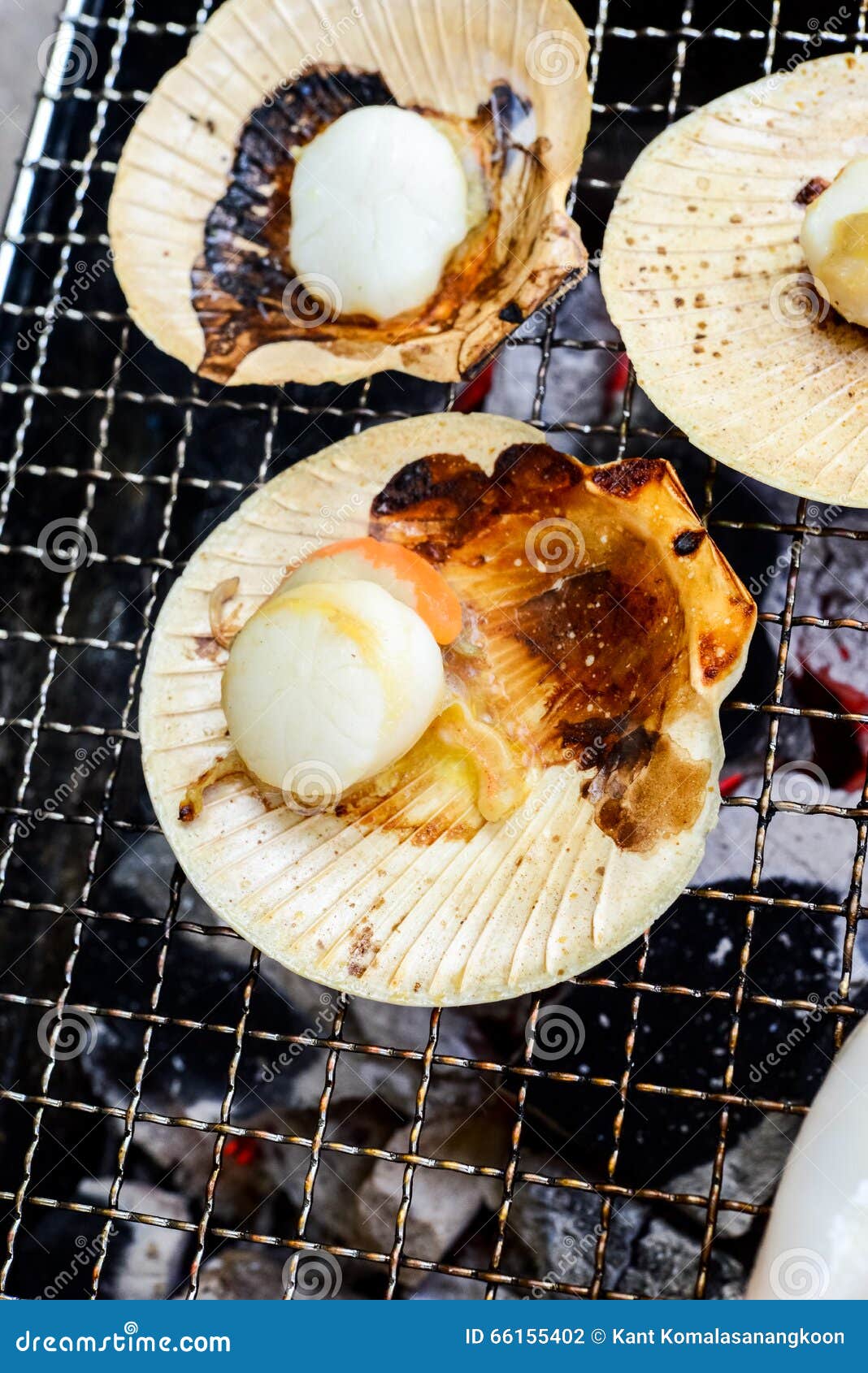 Scallop Seashell on the Grill with Flames Closeup Stock Photo - Image ...
