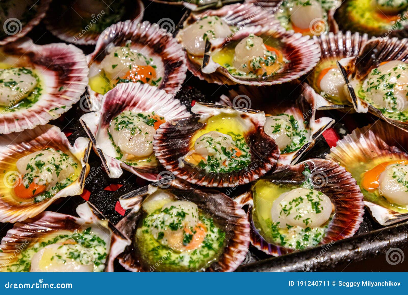 Scallops in Shells with Herbs and Seasonings are Grilled Stock Image ...