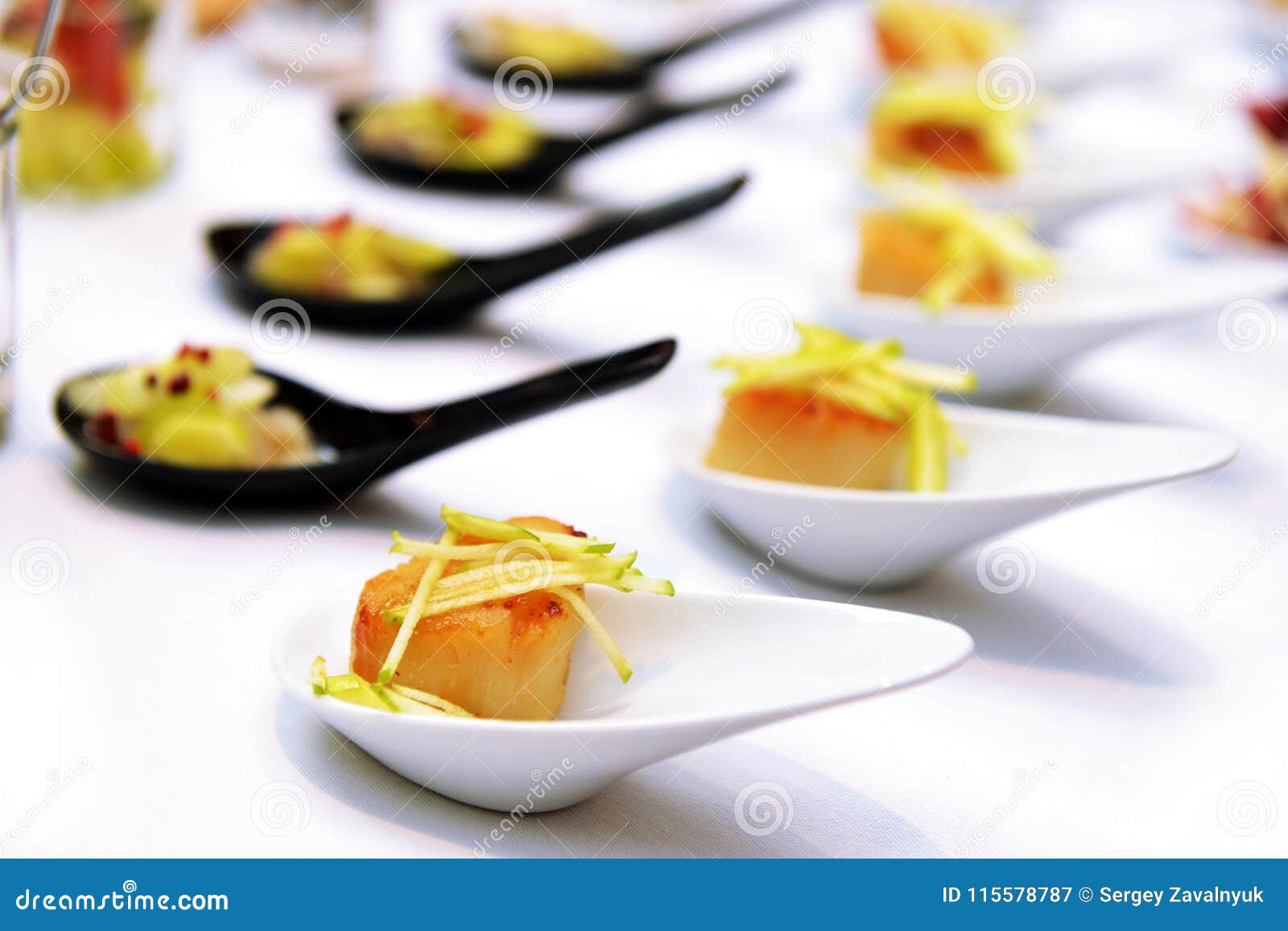 Scallops in the spoon stock image. Image of spoon, white - 115578787