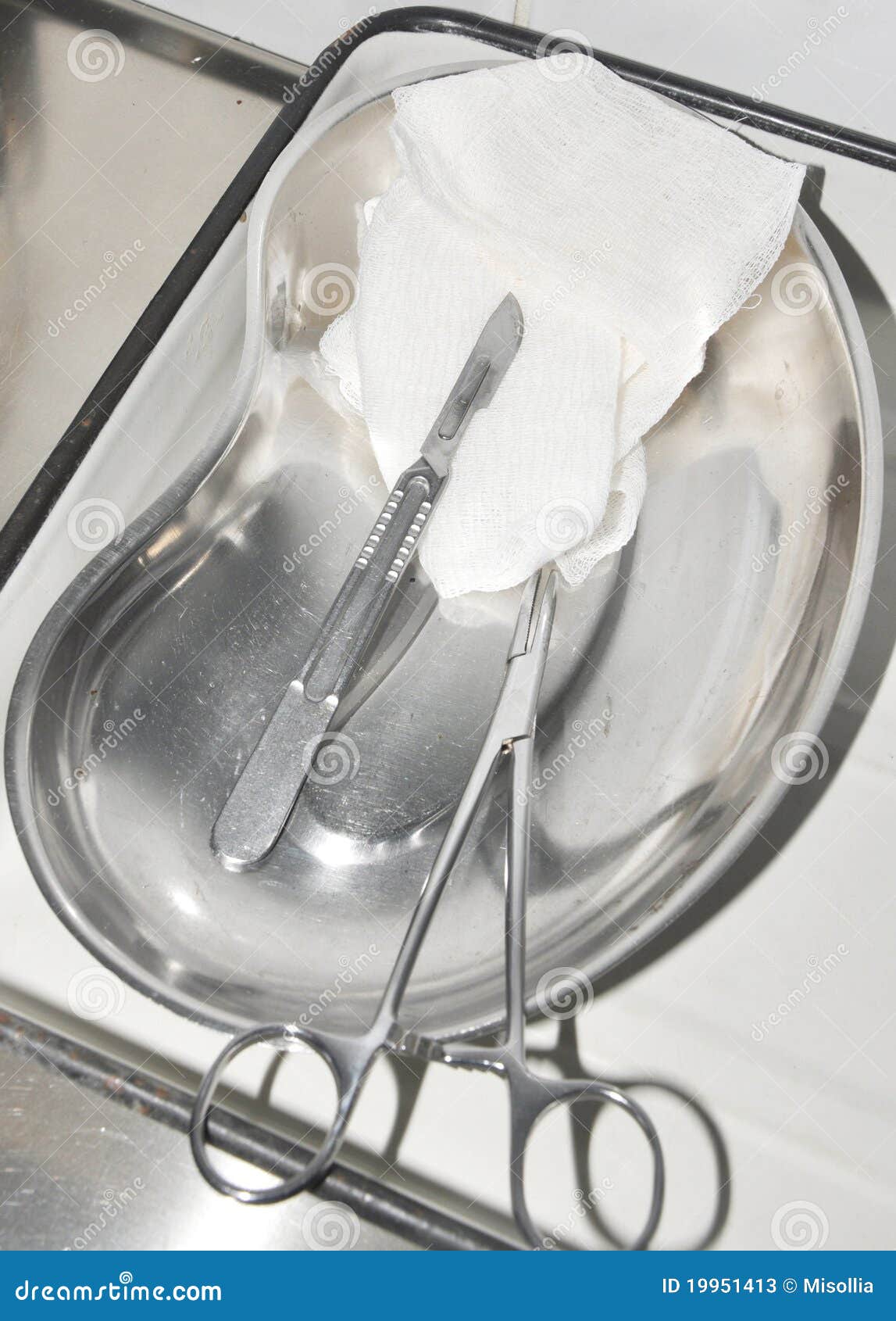 Scalpel and clip in a tray stock image. Image of hospital - 19951413