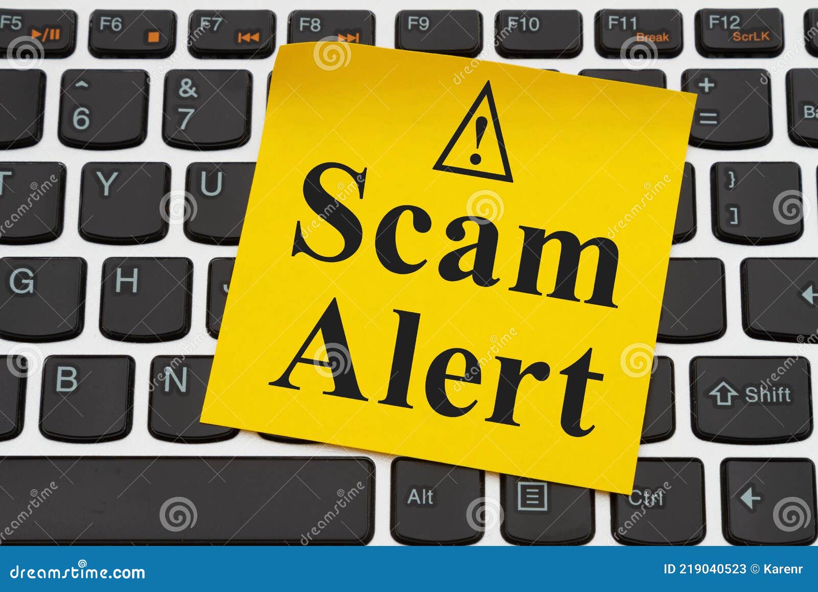 Scam Alert Message on Yellow Sticky Note on a Keyboard Stock Image ...