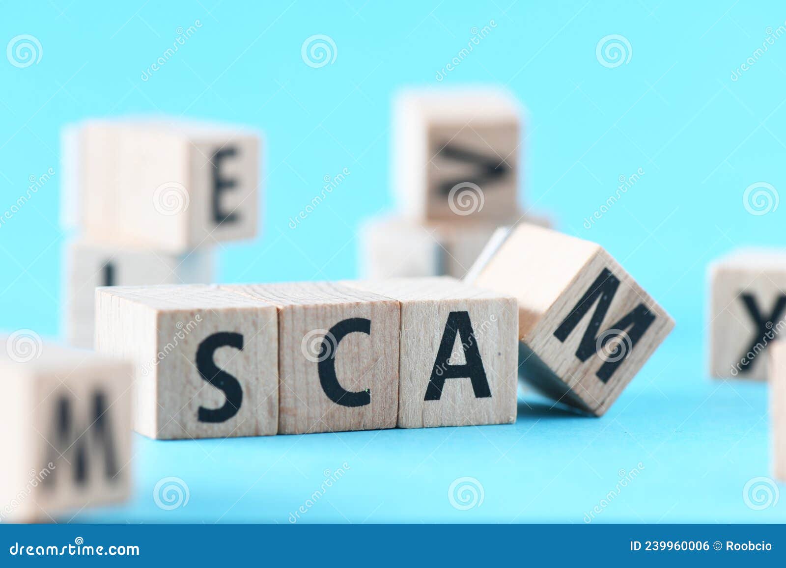 SCAM Word Written on Wooden Cubes Standing in a Row Stock Photo - Image ...