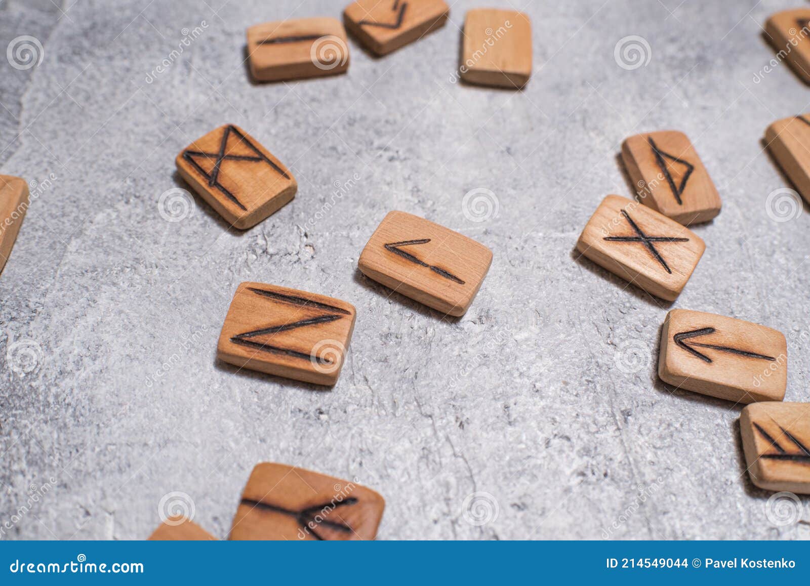 Scandinavian Magic Runes Made of Oak on Concrete. Stock Photo - Image ...