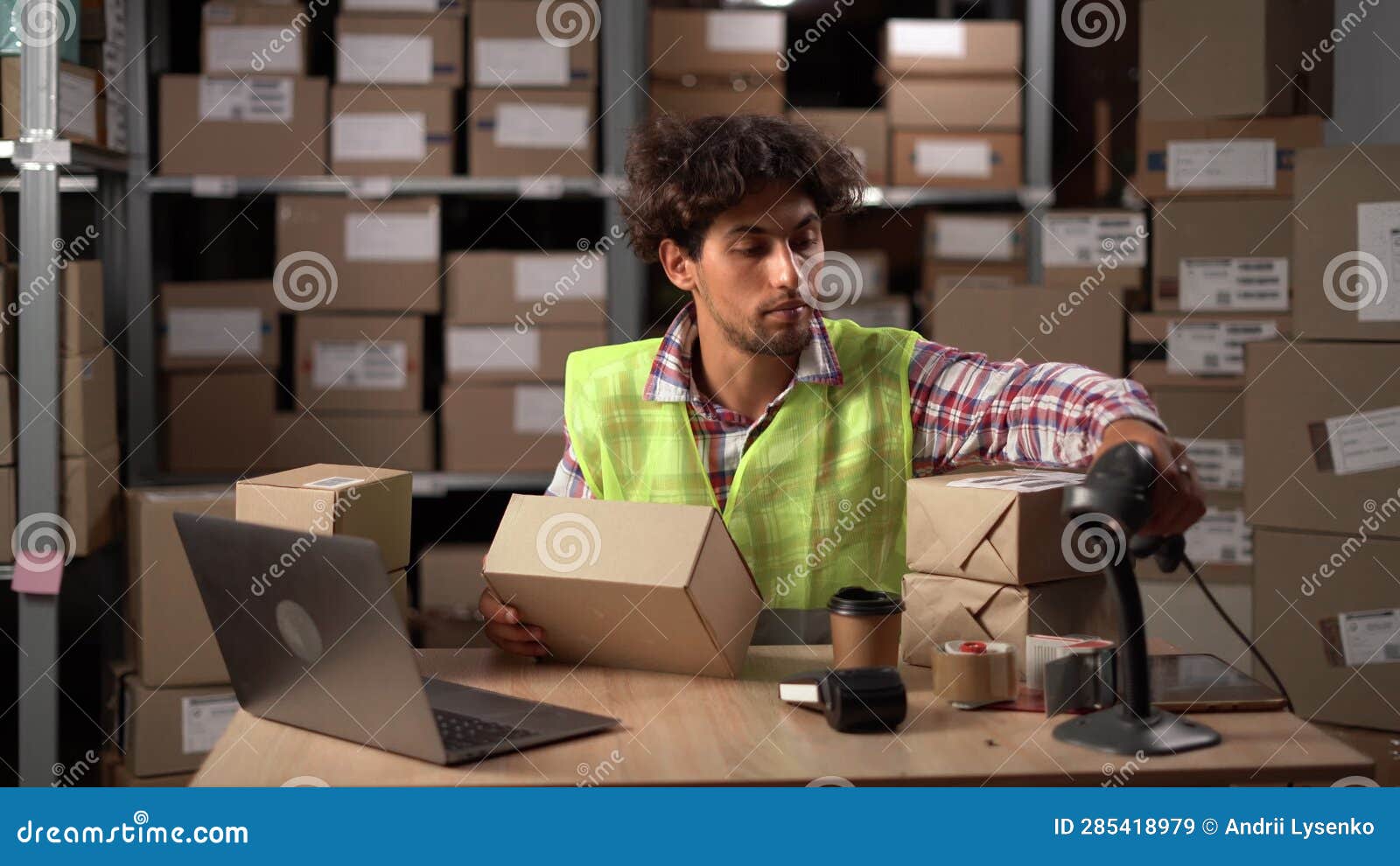 Scanning Barcode on Delivery Parcel. Worker Putting Labels and Scan ...