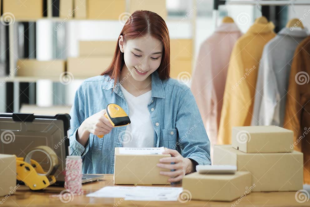 Scanning Barcode on Shipping Box with Scanner Stock Photo - Image of ...