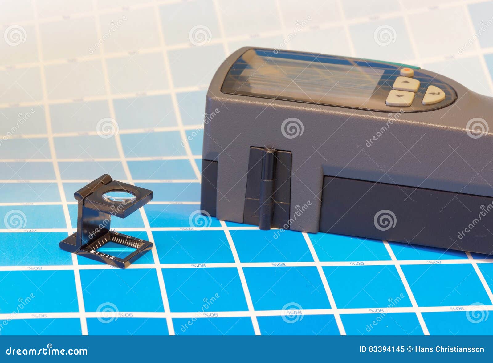 Scanning Densitometer and a Magnifyer on a Leaf of the Test Print Stock ...