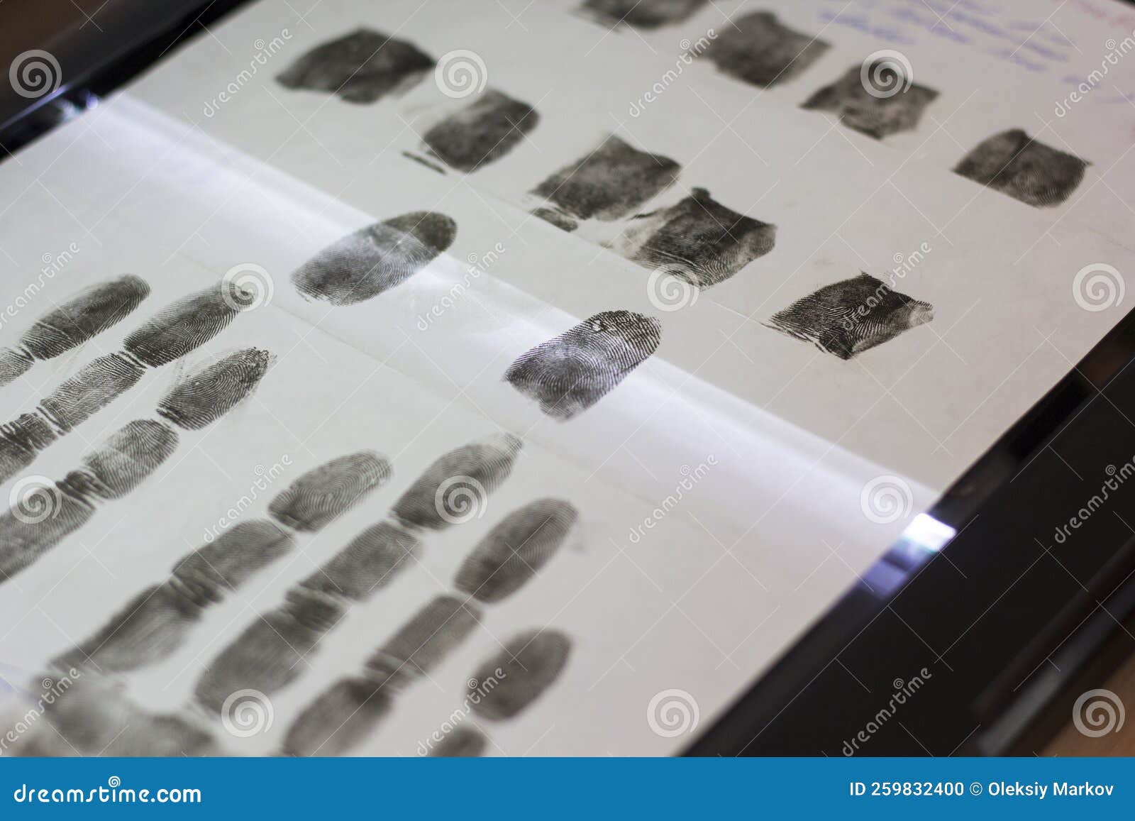 Scanning the Fingerprints of a Suspected Person in a Crime Stock Photo ...