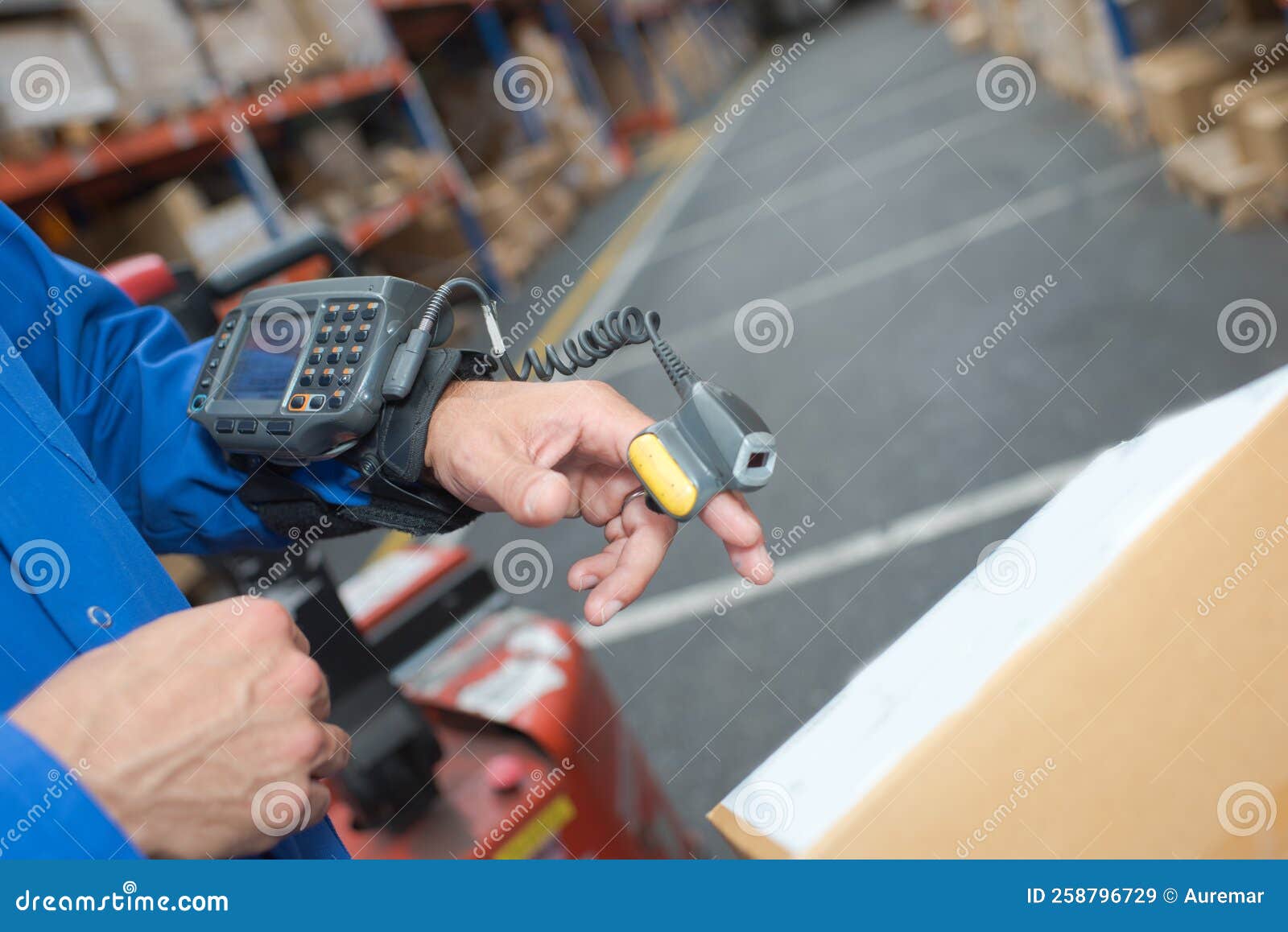 Scanning Parcel in Warehouse with Finger Scanner Stock Image - Image of ...