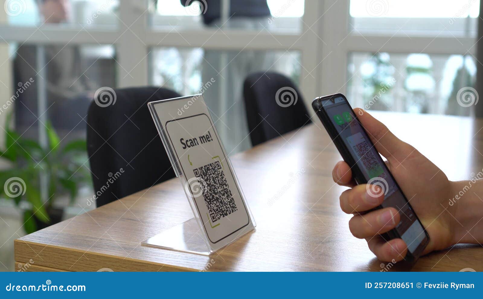 Scanning the QR Code on the Display Using a Smartphone. Internet URL ...