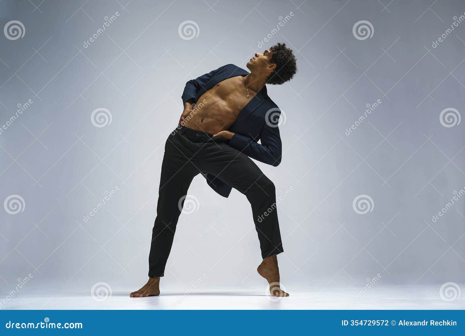 Scantily Clad Mulatto Dancer, Ballet Dancer, Man Shows Dance Elements ...