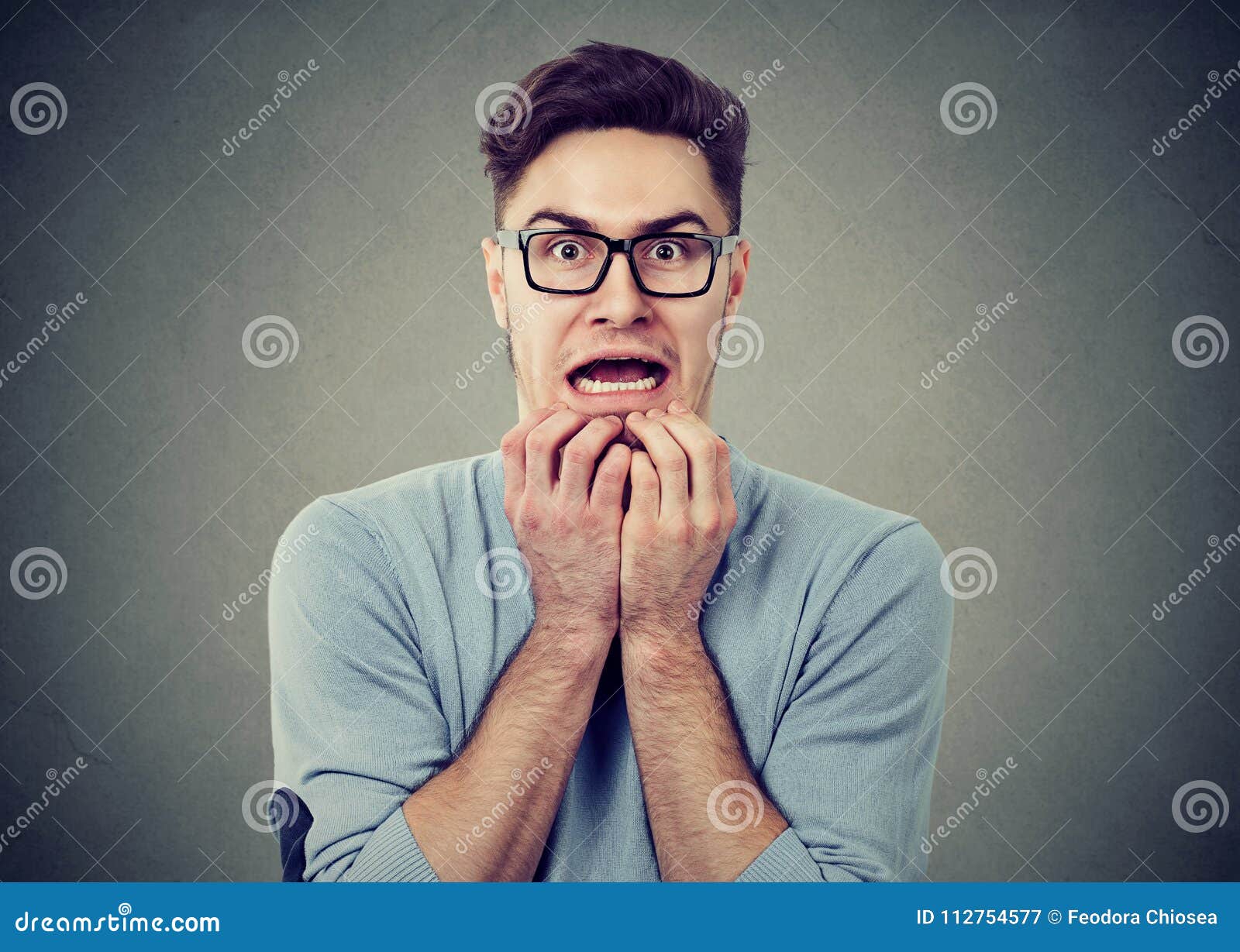 Scared Anxious Man on Gray Backdrop Stock Image - Image of feeling ...