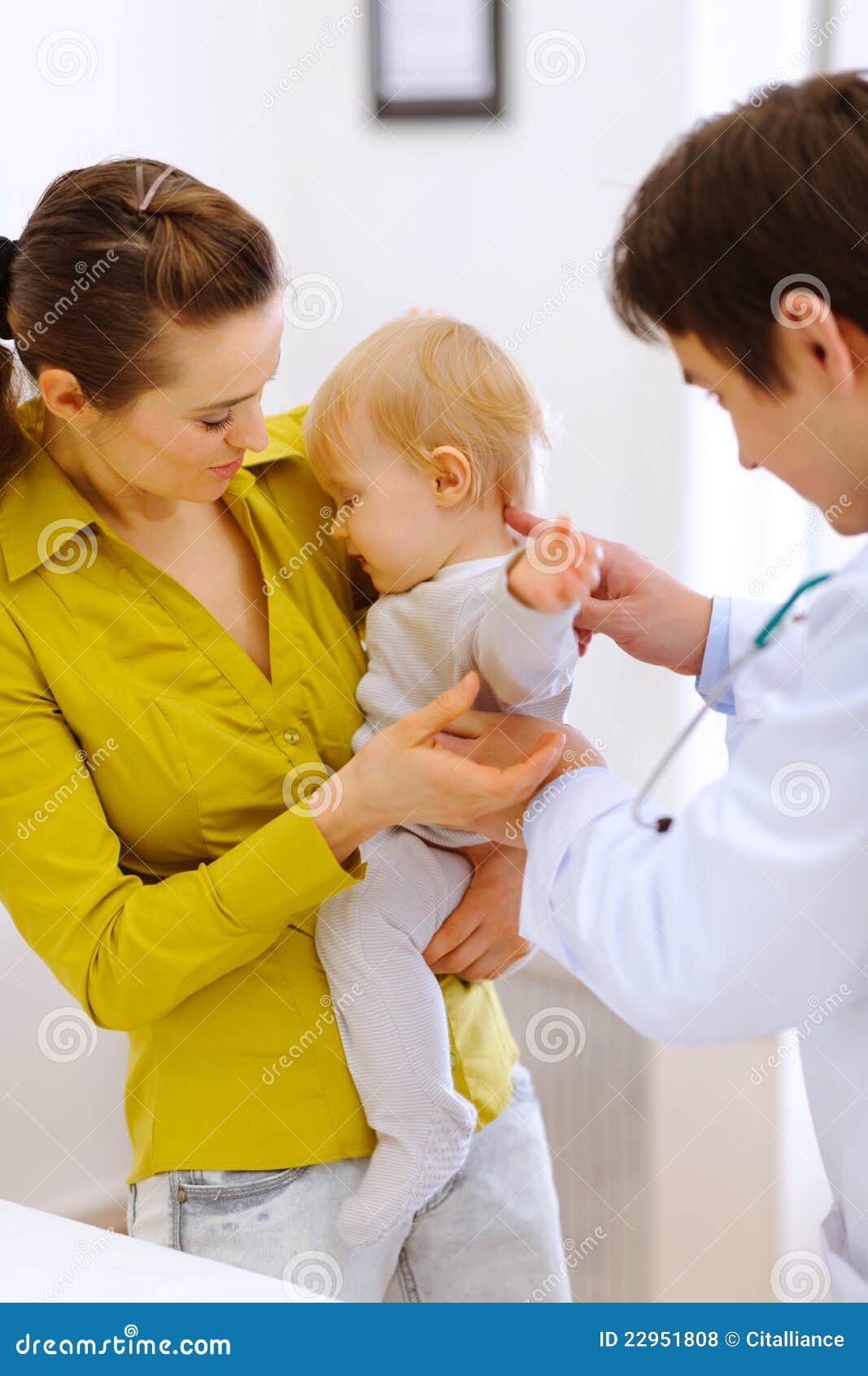 Scared baby on examination stock photo. Image of pediatric - 22951808
