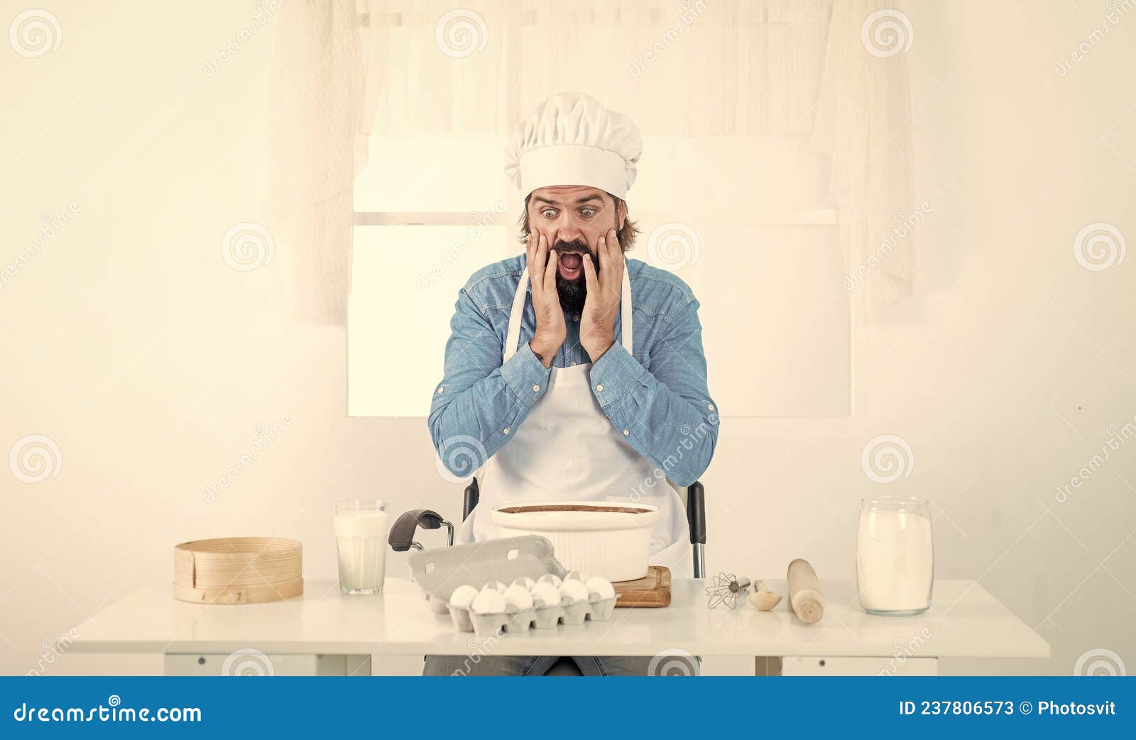 Scared Baker Has Some Problems while Cooking. Male Chef in Hat Prepare ...