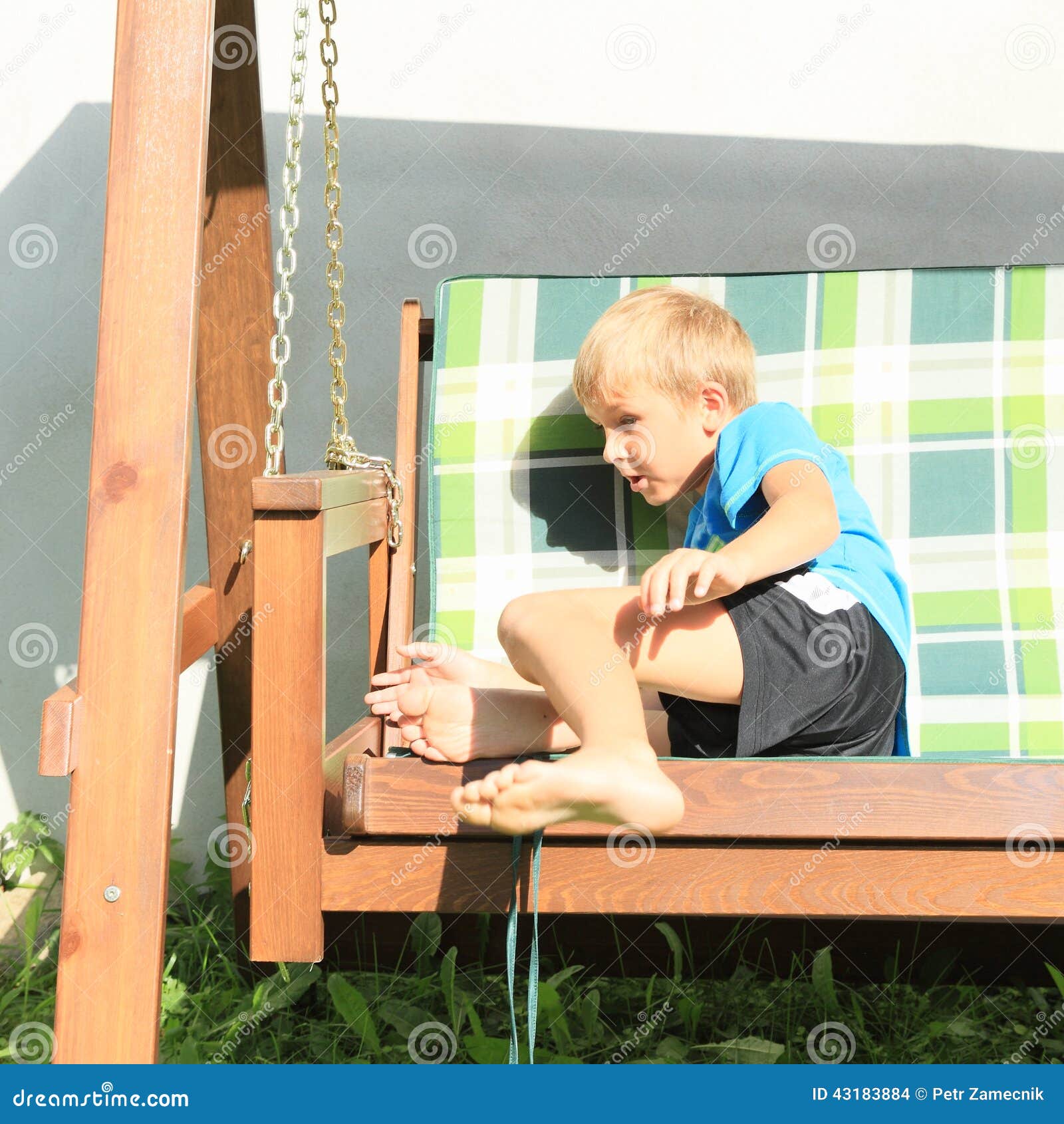 Scared Boy Sitting on a Wooden Swing Stock Photo - Image of child ...