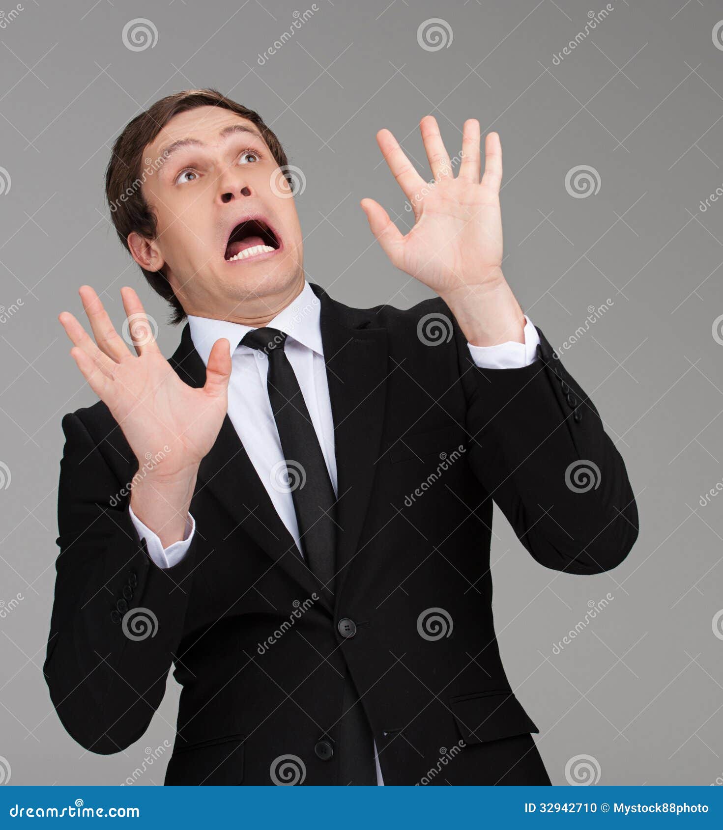 Scared businessman. stock photo. Image of grimacing, formalwear - 32942710