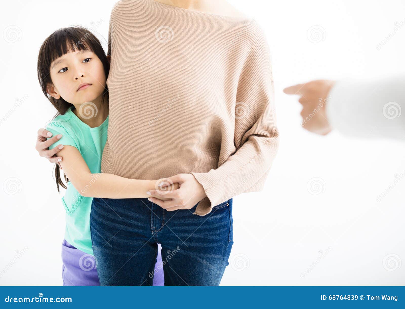 Scared Daughter Hiding Behind Mother Stock Image - Image of hiding ...