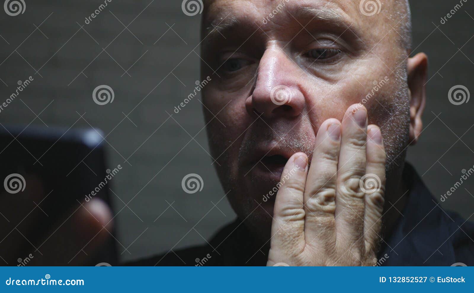 Scared and Disappointed Businessperson Text Using Cellphone ...