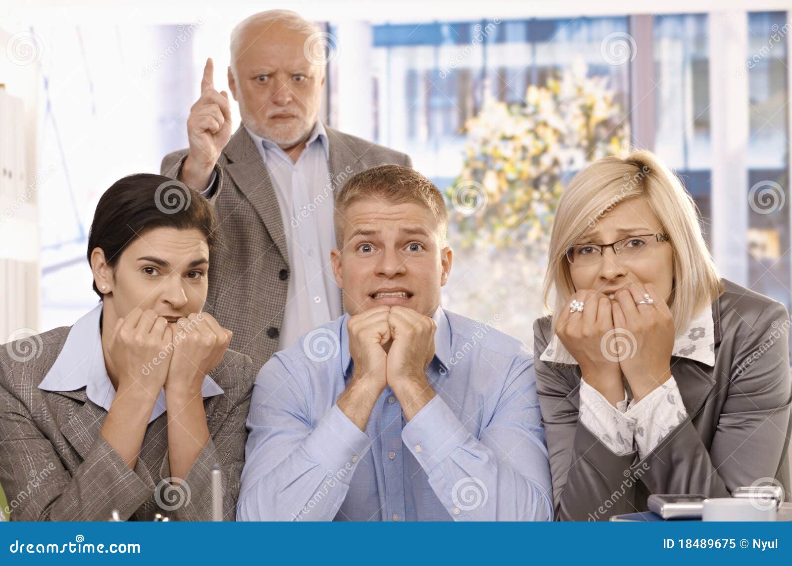 Scared Employees Sitting with Angry Boss Behind Stock Image - Image of ...