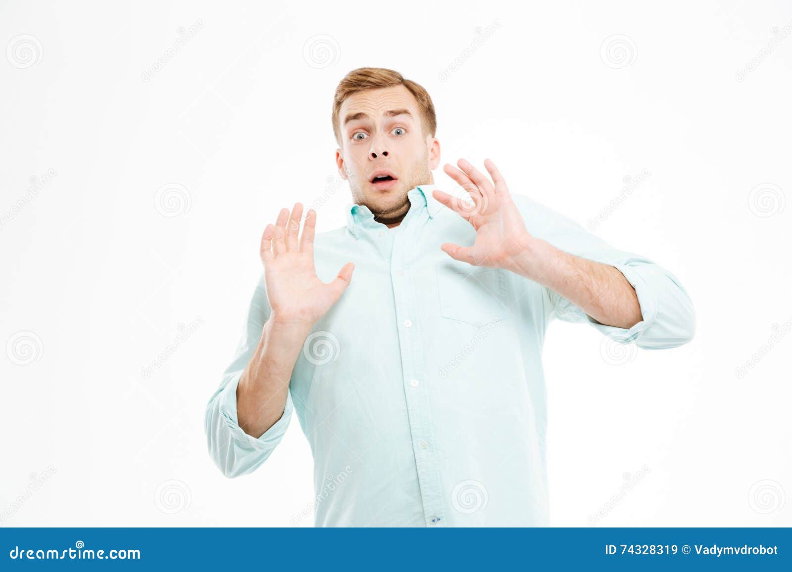 Scared Frightened Young Man Holding Hands In Front Of Himself Stock ...