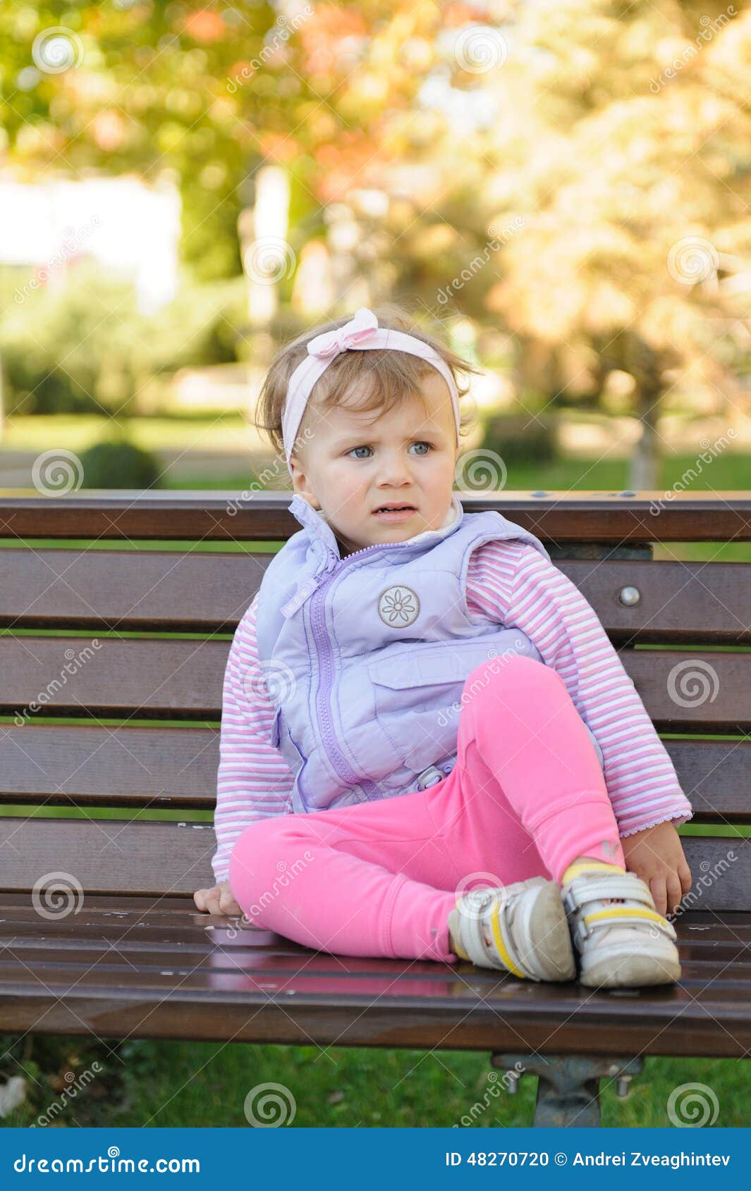 Scared Girl on Bench stock photo. Image of park, outdoors - 48270720