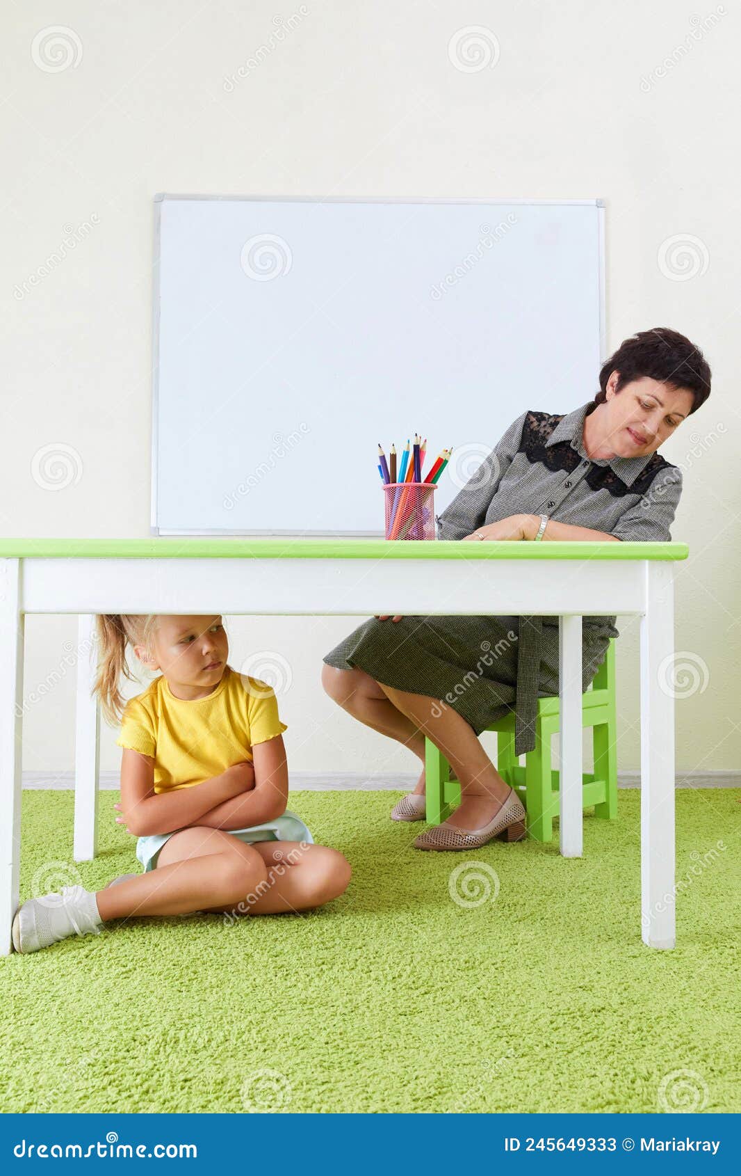 Scared Girl Hiding Under Table Sitting on a Floor Stock Image - Image ...