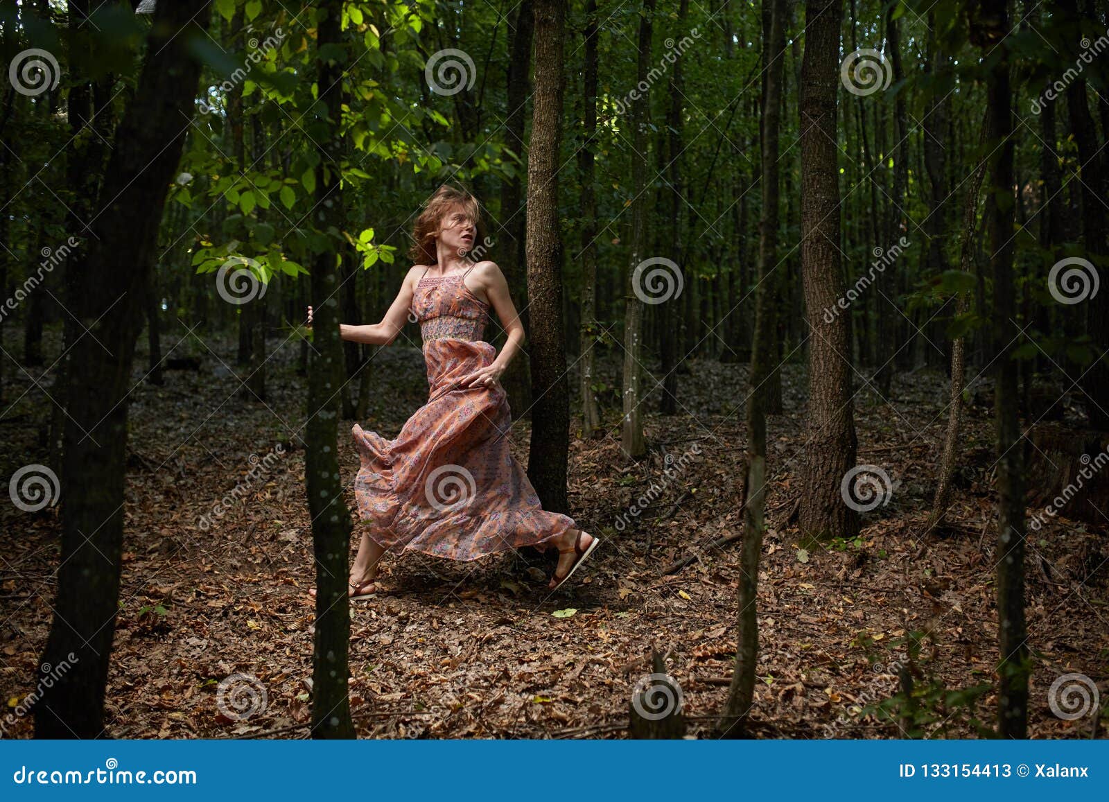 Scared Girl Running through Forest Stock Image - Image of scare, nature ...