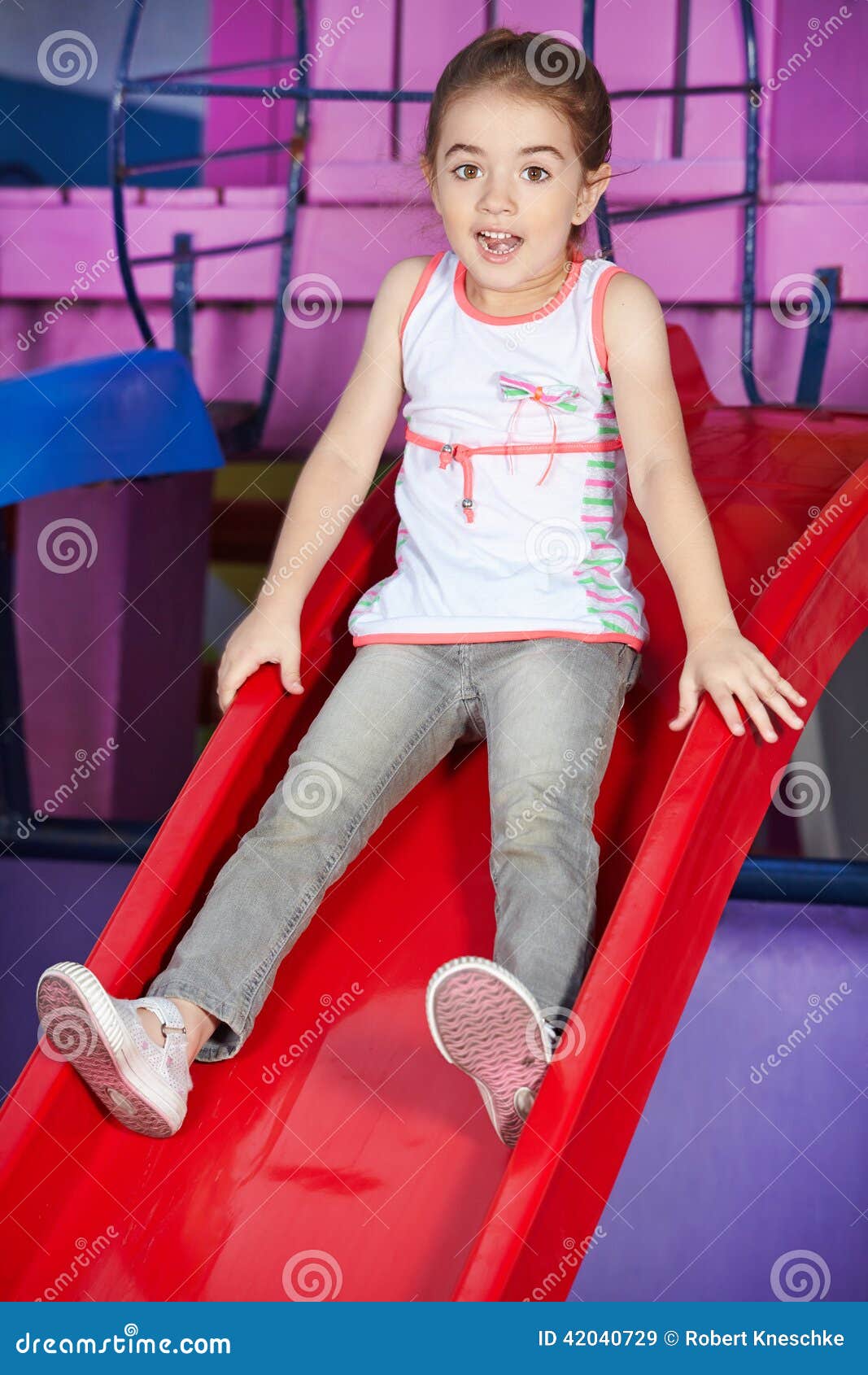Scared girl on slide stock image. Image of fear, frightened - 42040729