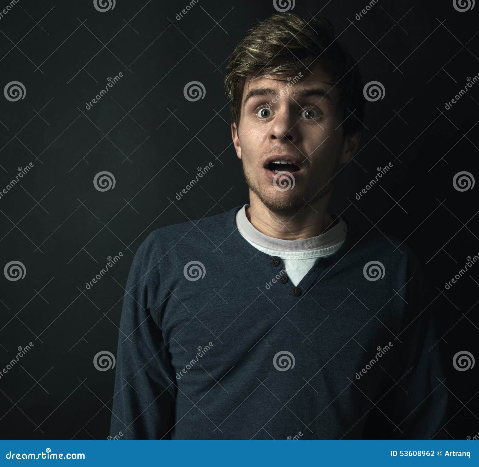 Scared guy in the dark stock photo. Image of open, looking - 53608962