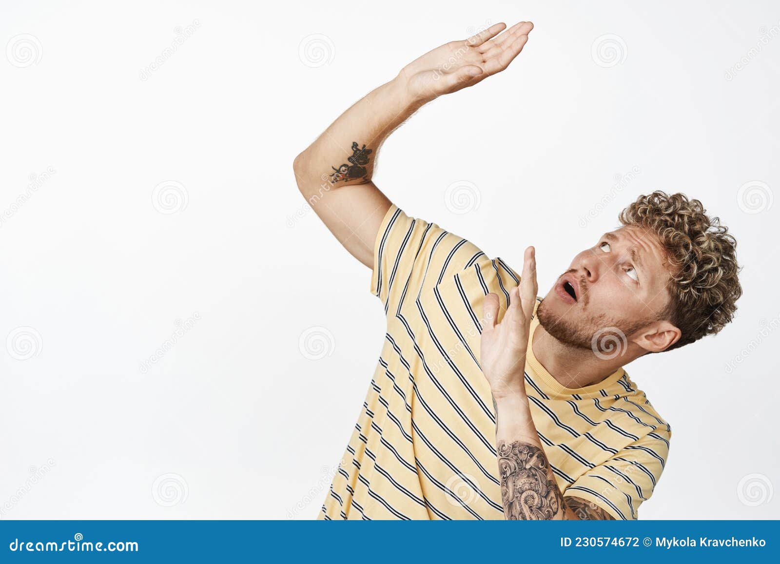 Scared Guy Defending Himself from Something Falling from Above, Bending ...