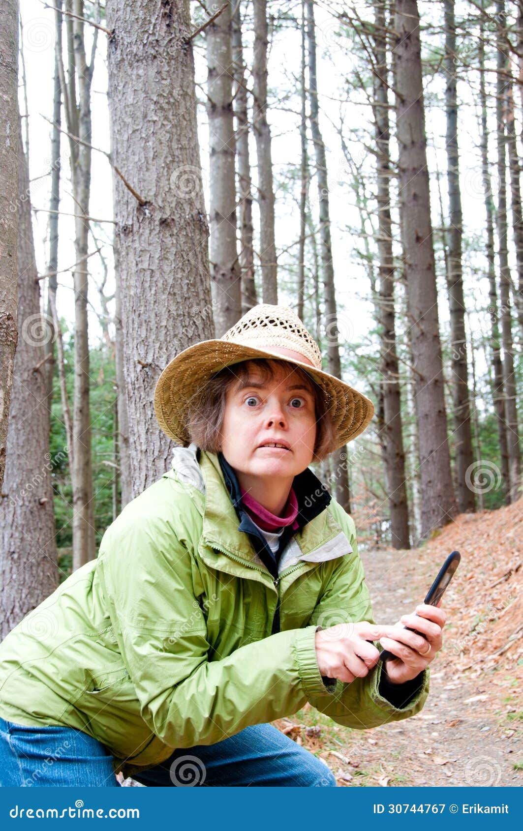 Scared hiker dials phone stock image. Image of park, alarmed - 30744767