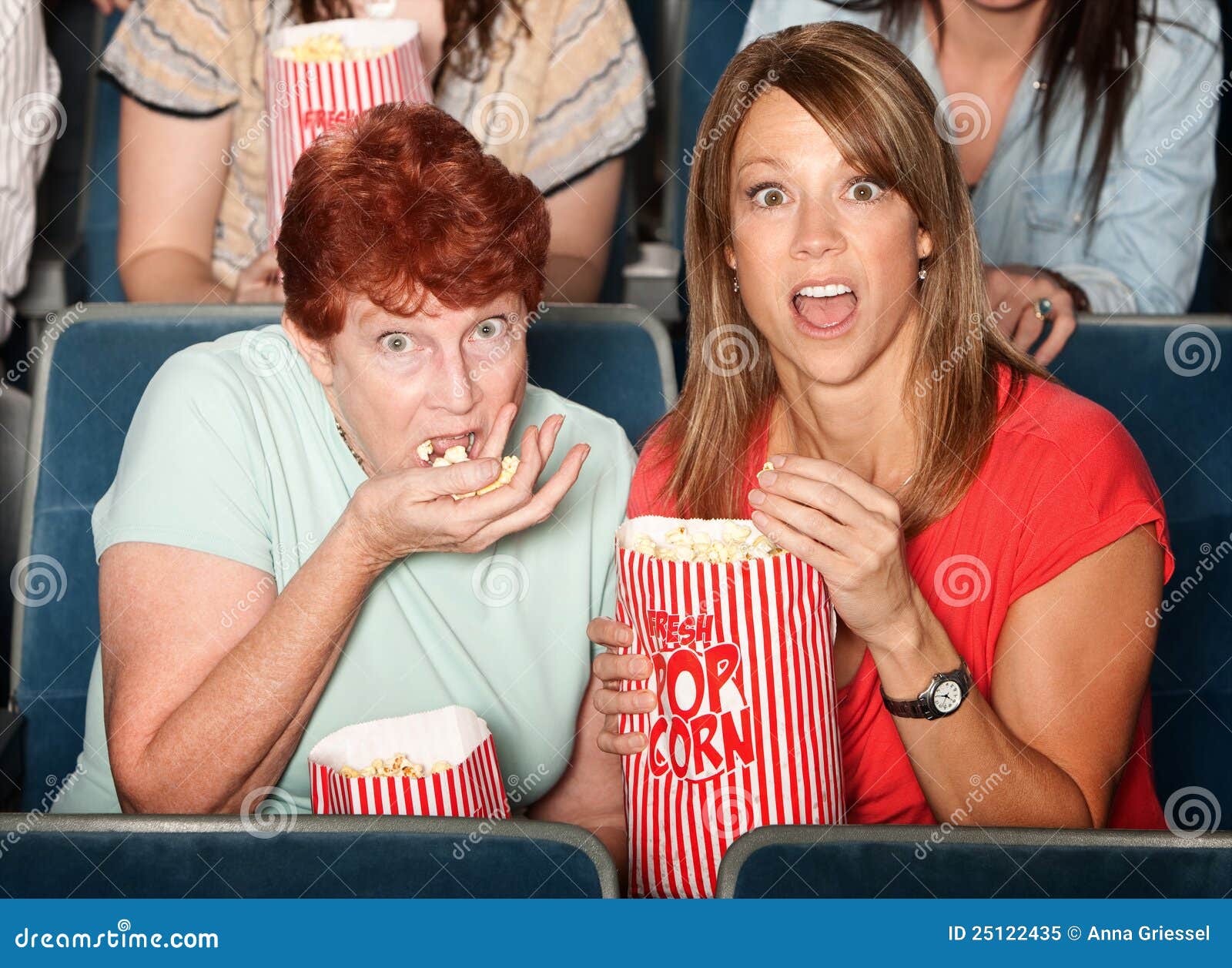 Scared Ladies in Theater stock image. Image of crowd - 25122435