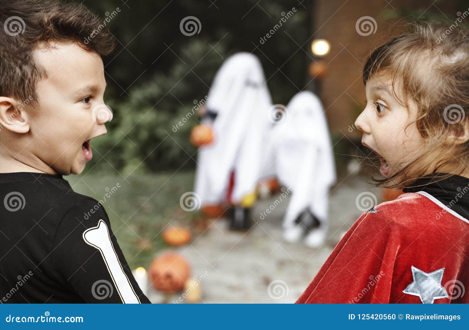 Scared Little Girl Hiding Under Blanket At Night And Looking For ...